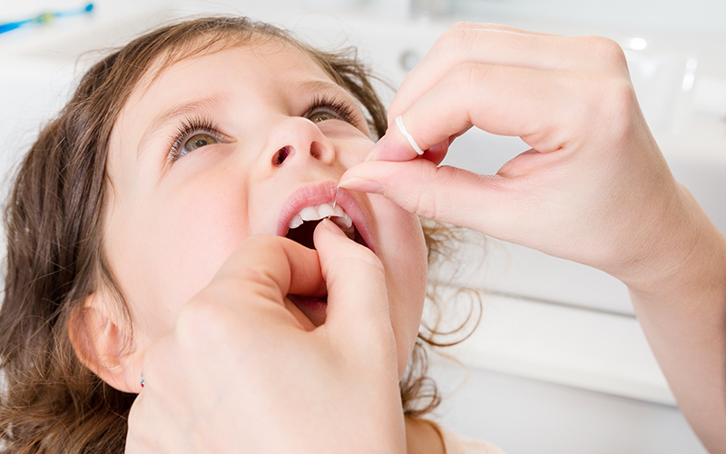 Make Flossing a Key Part of Early Oral Care - First Things First